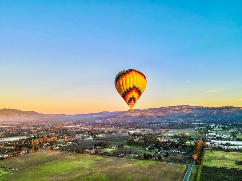 California's July Hot Air Balloon Festival Fills The Morning Sky With Color