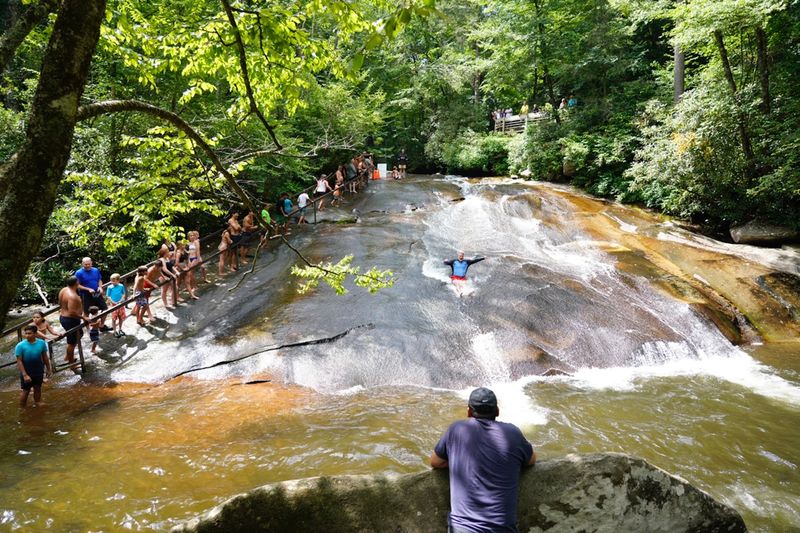 This North Carolina Waterfall Lets You Slide Straight Into A Mountain Pool